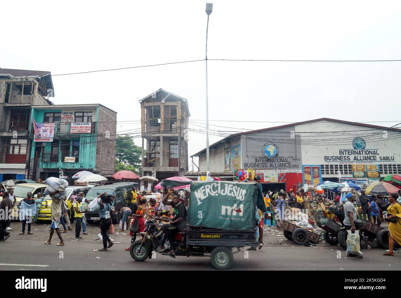 Daily life along the streets in the city centre of Kinshasa in the ...