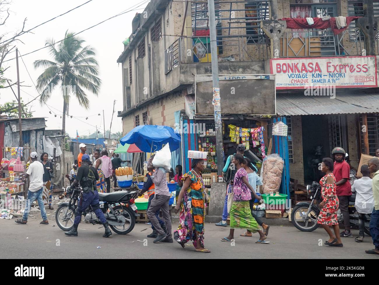 Daily life along the streets in the city centre of Kinshasa in the ...