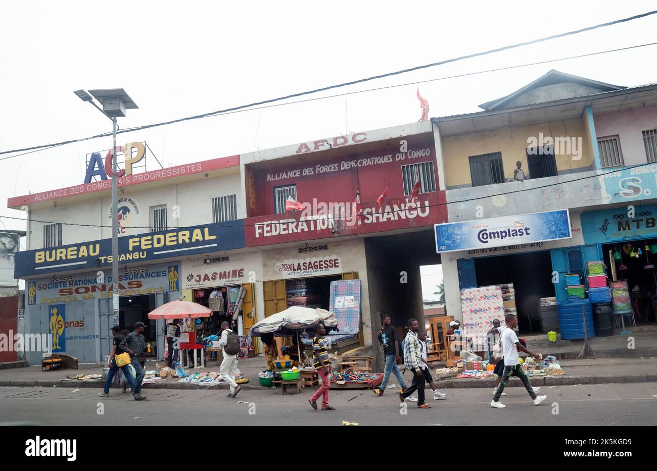 Daily life along the streets in the city centre of Kinshasa in the ...