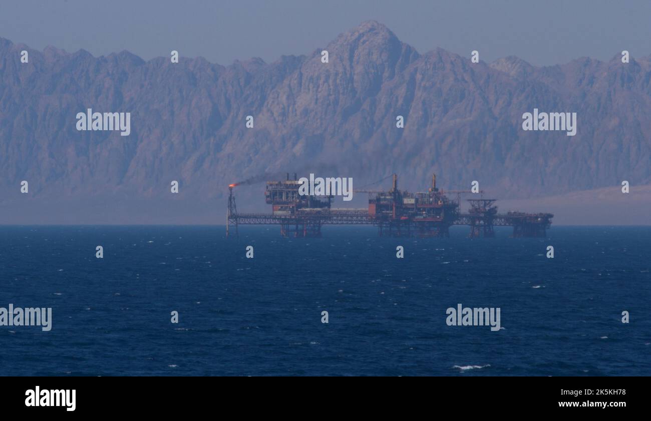 Oil drilling platform in the red sea with Sinai mountains in the ...