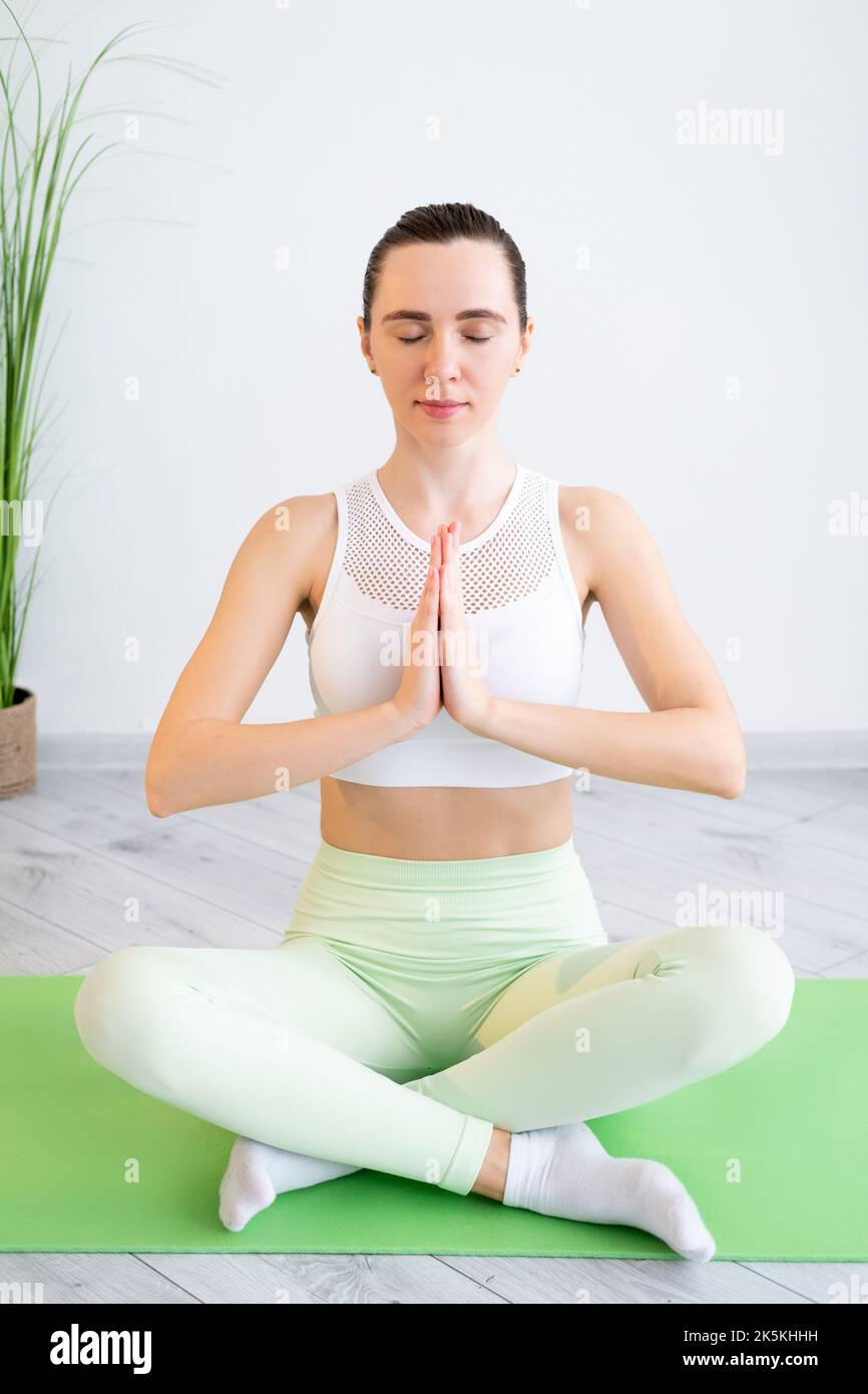 Woman practicing mindful yoga hi-res stock photography and images - Alamy