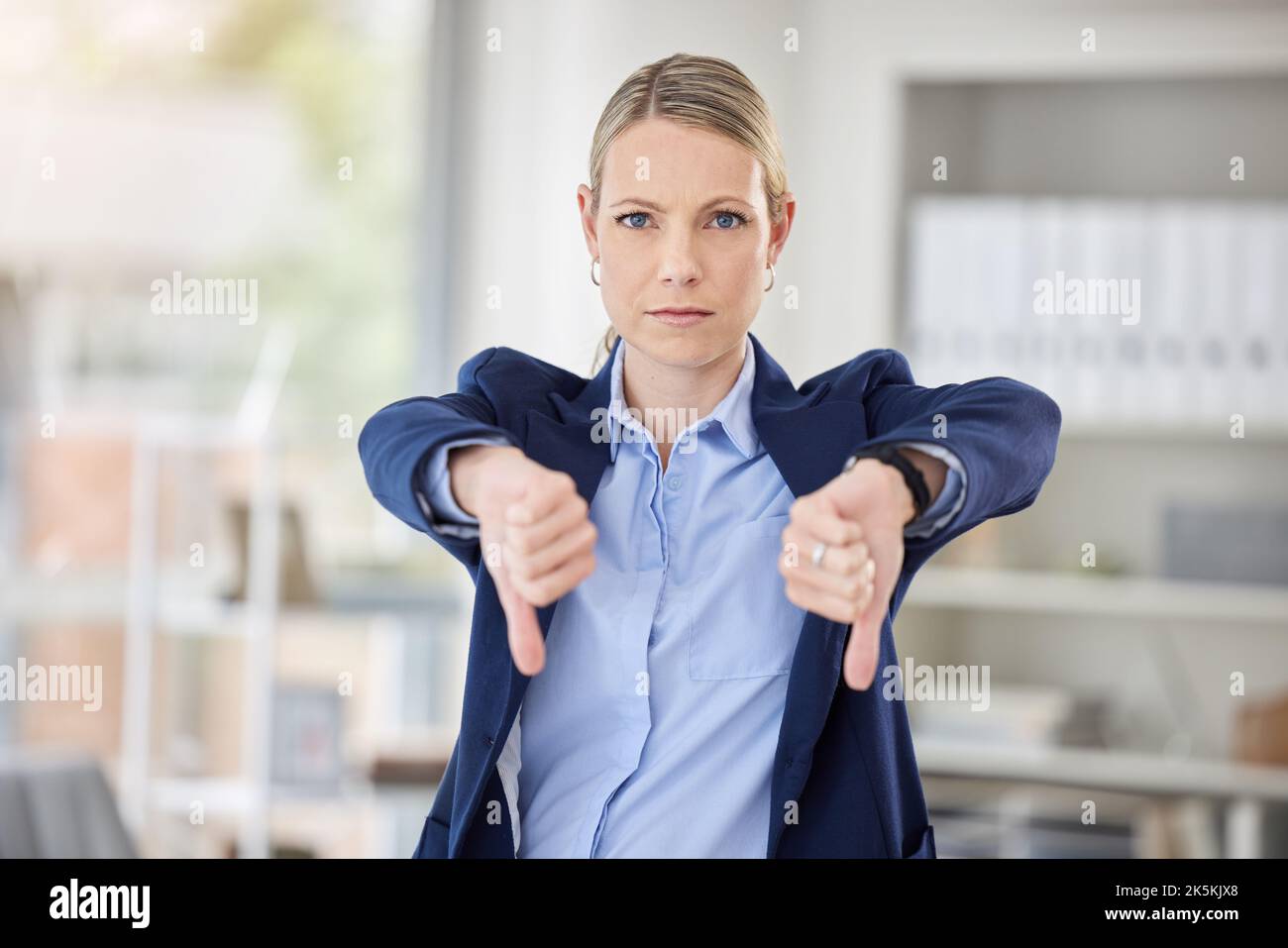 Business woman, thumbs down and hands in failure, loss or disappointed ...