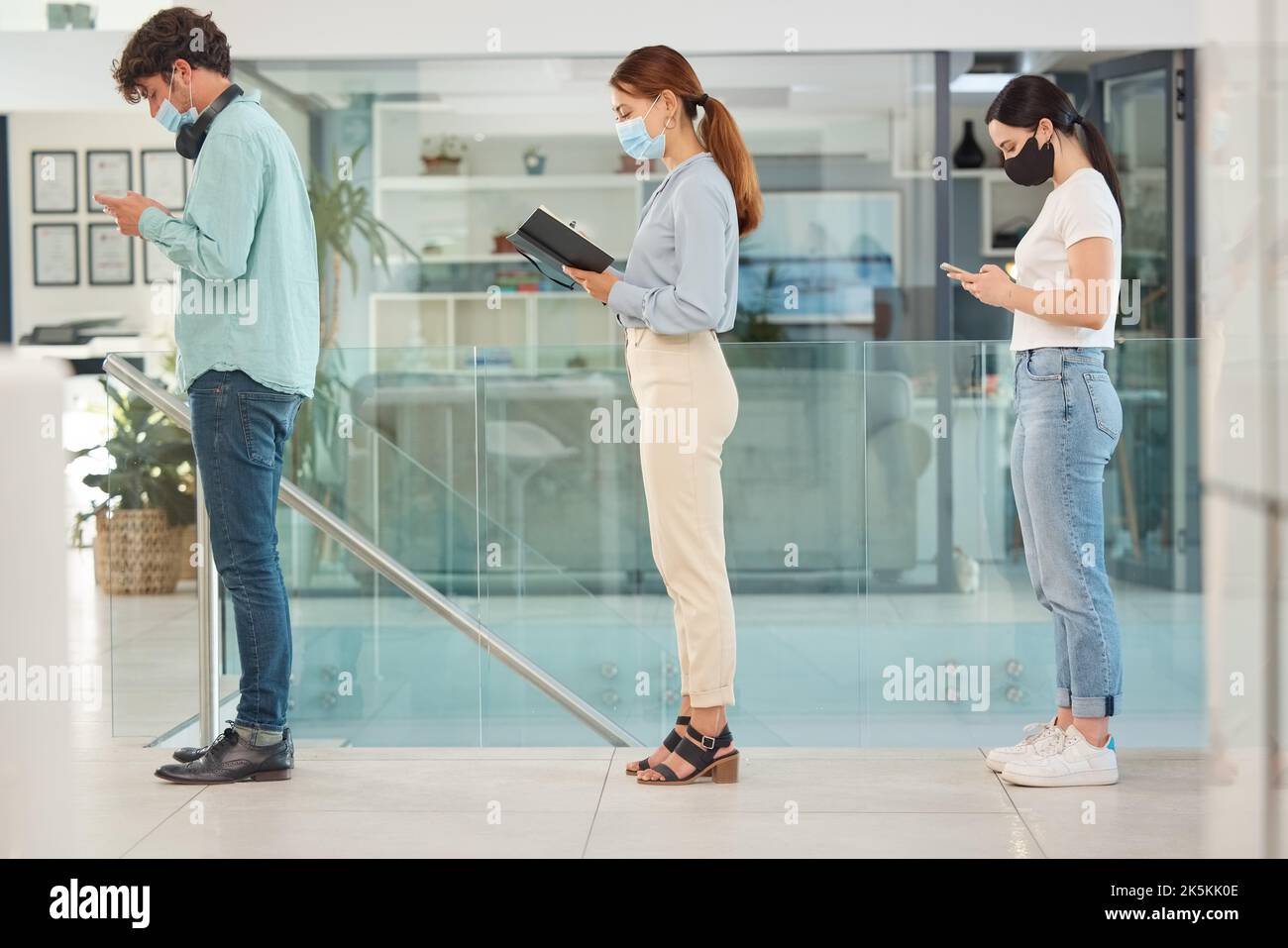 Covid, screening and queue with people waiting in line to enter an ...
