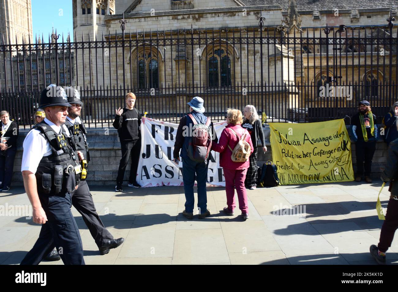 Thousands of supporters of Julian Assange formed a human chain around ...
