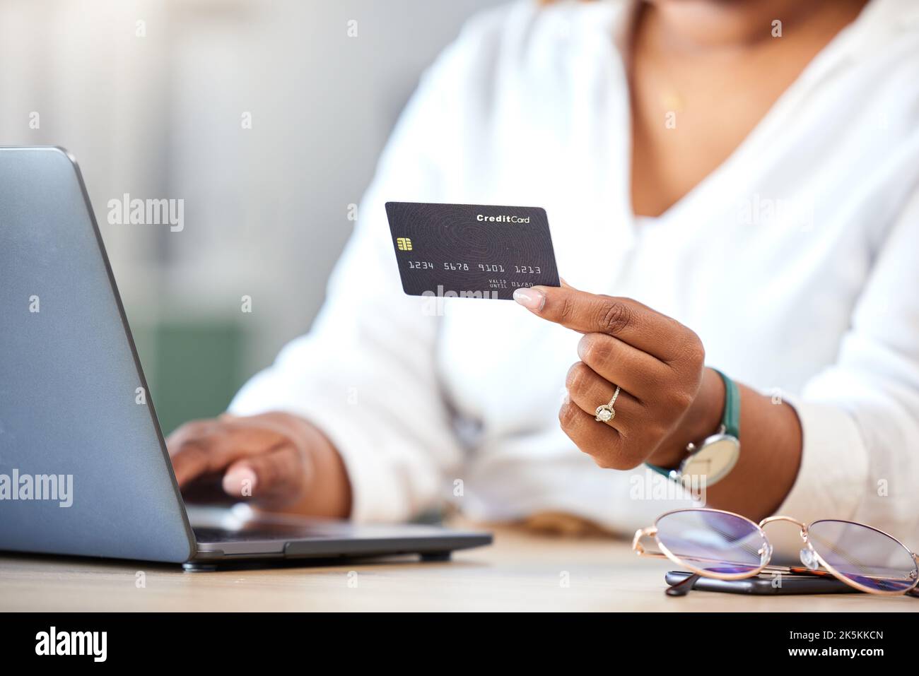 Finance, fintech woman and online shopping with credit card, laptop and ...