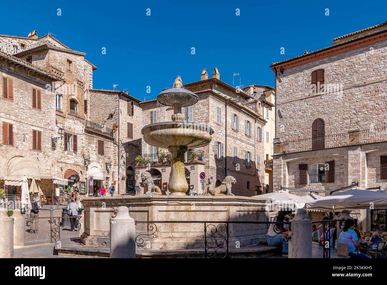 The ancient fountain of the three lions, Piazza del Comune square ...