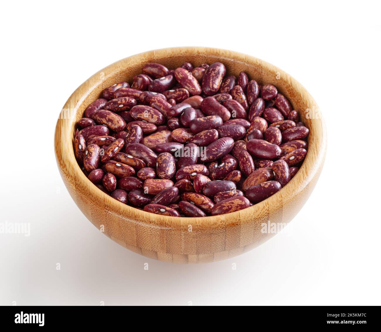 Red pinto beans in wooden bowl isolated on white background with ...