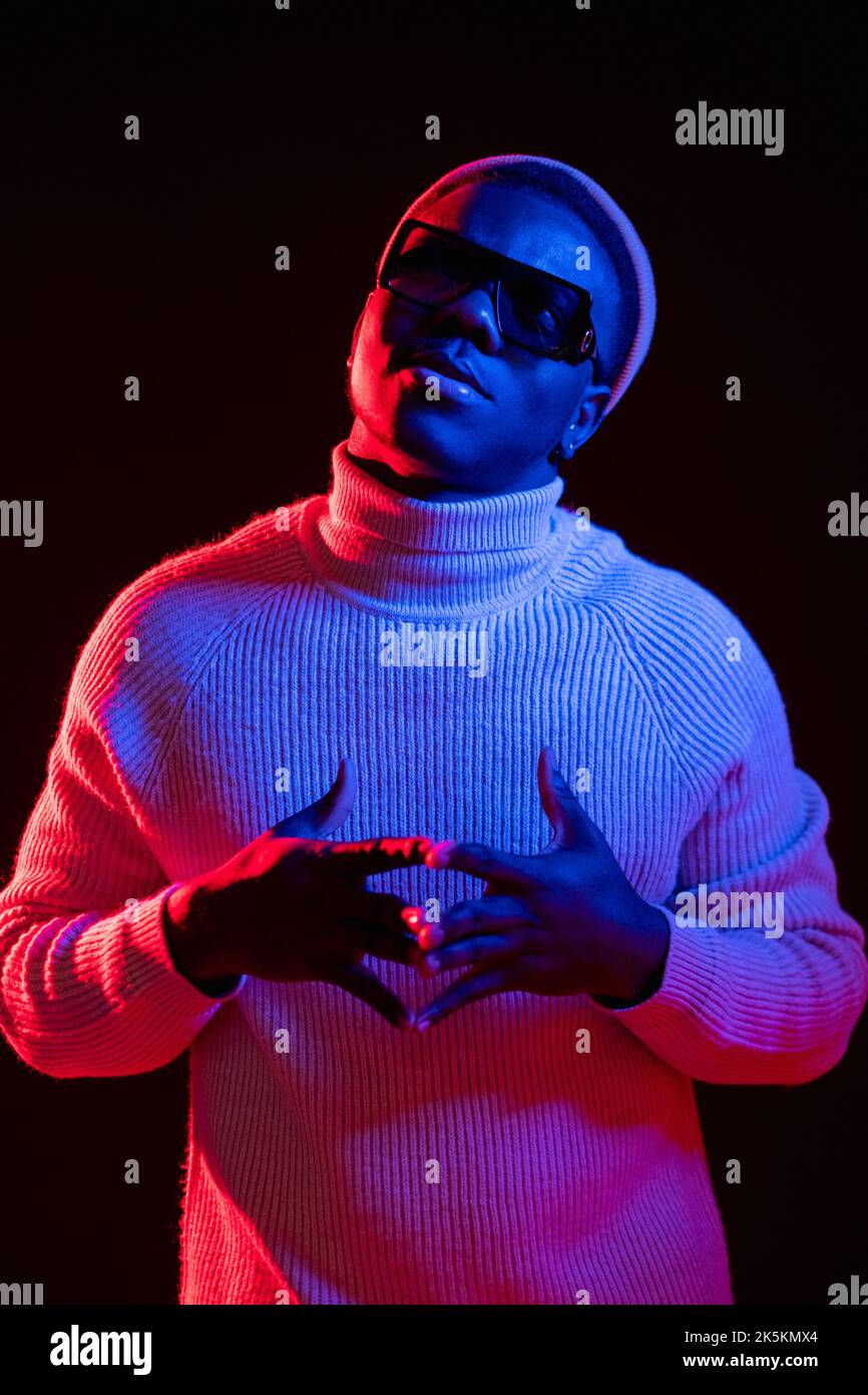 thinking man decision making choice red neon light Stock Photo - Alamy