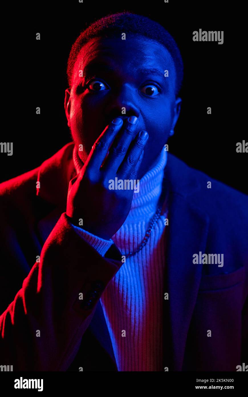 shocked man omg face portrait surprise neon light Stock Photo - Alamy