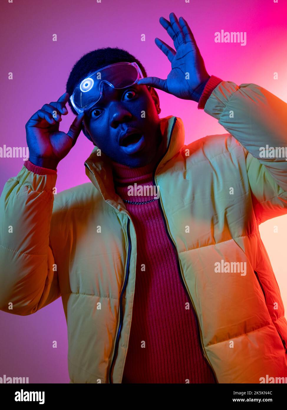 shocked man omg face portrait surprise neon light Stock Photo - Alamy