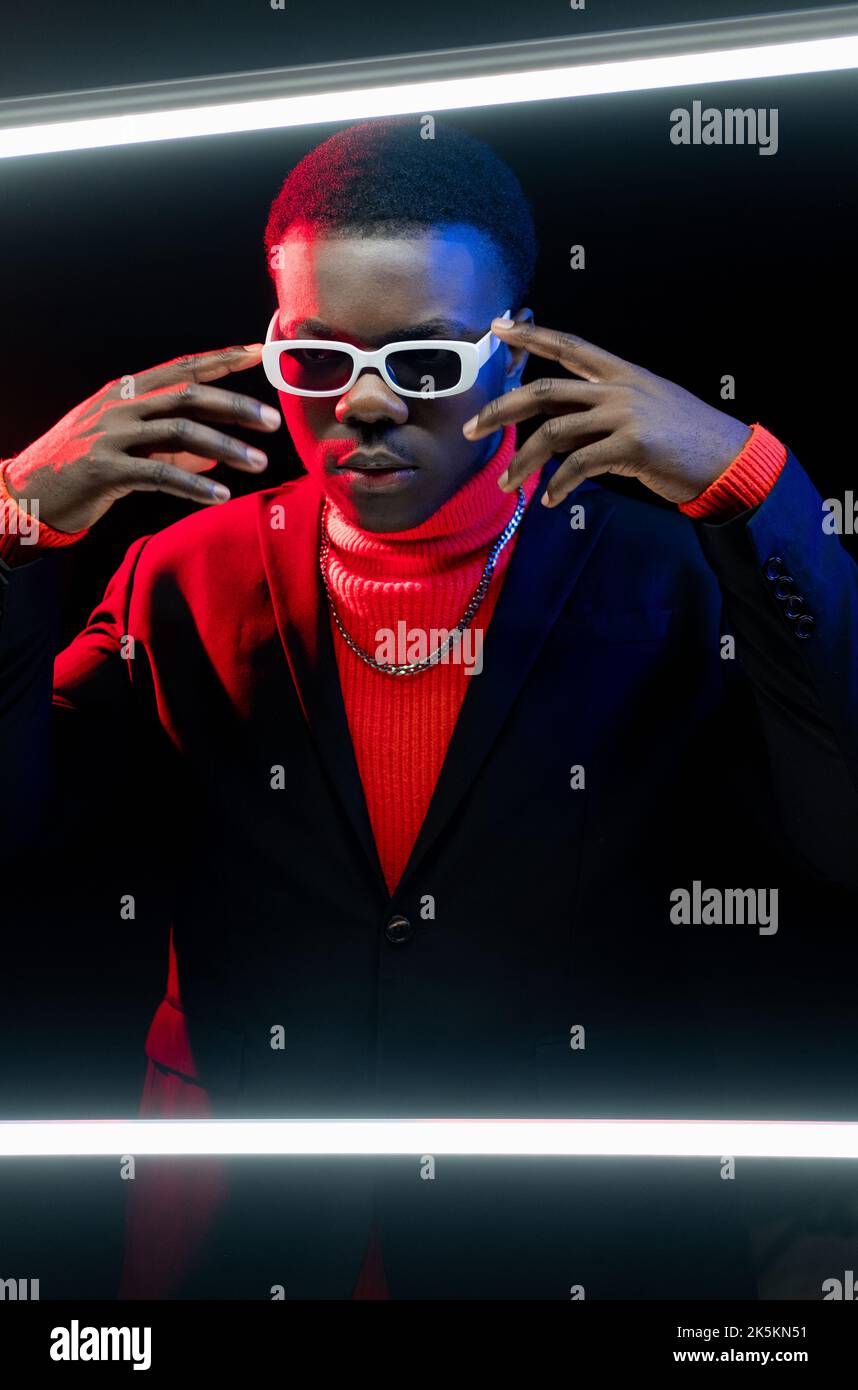 successful man color light people neon night club Stock Photo - Alamy