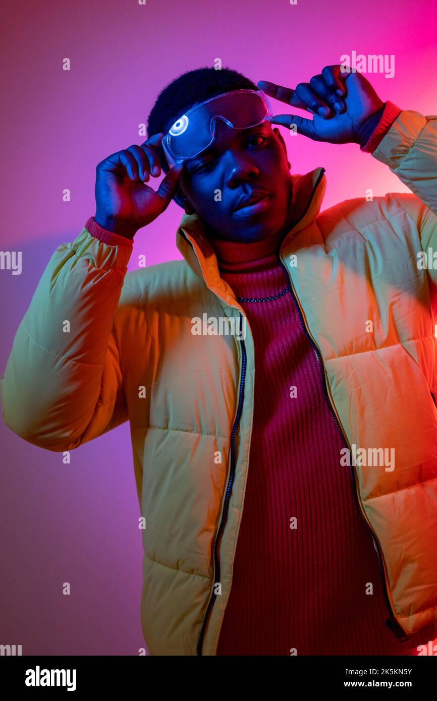 trendy neon light modern fashion stylish cool man Stock Photo - Alamy