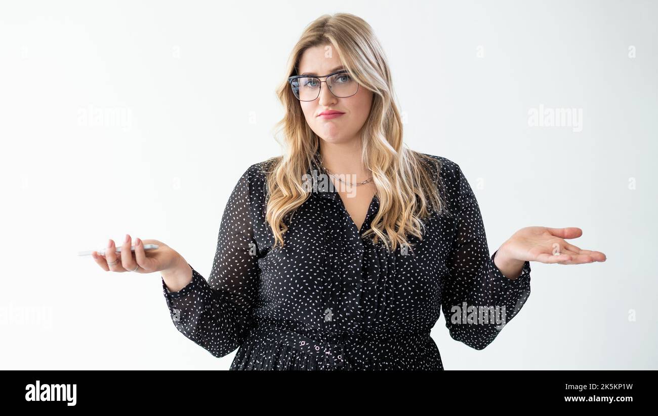 confused woman portrait clueless shrug obese model Stock Photo - Alamy