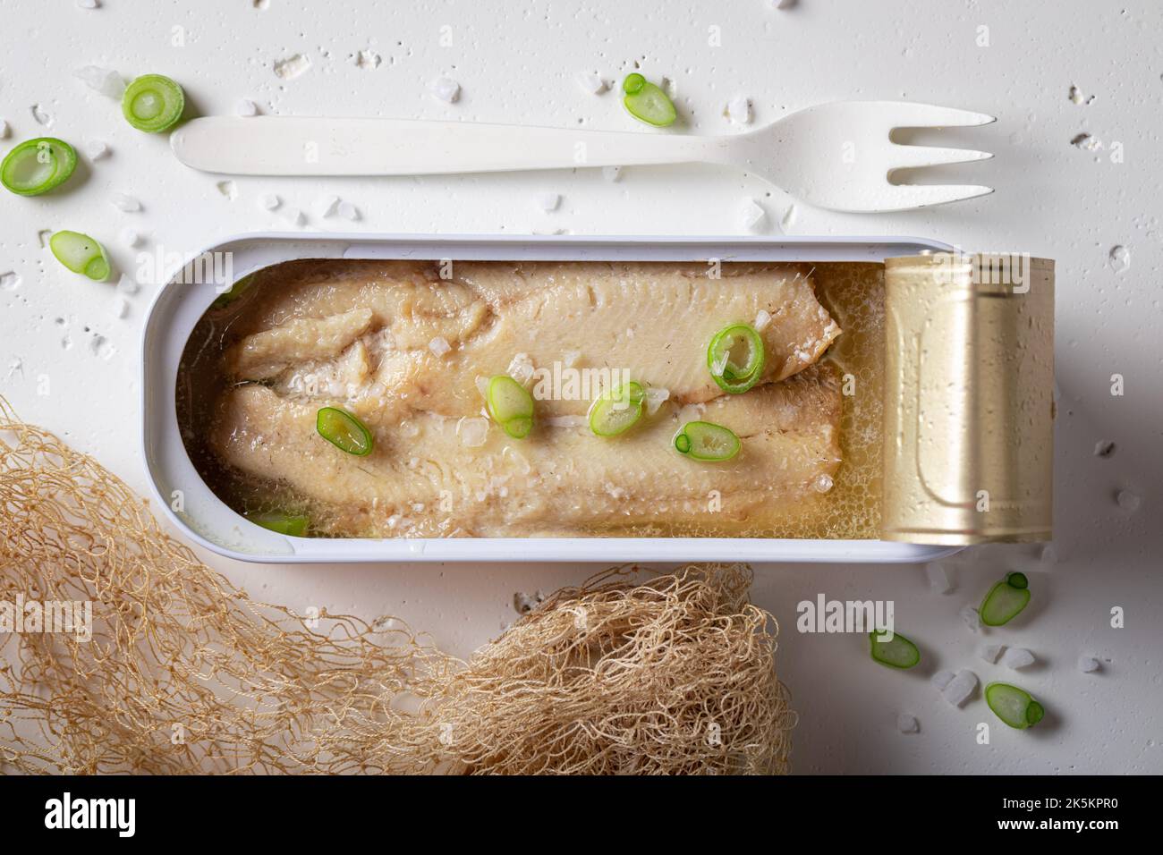 Raw and fresh herring as source of omega fat. Fish in can with salt and ...