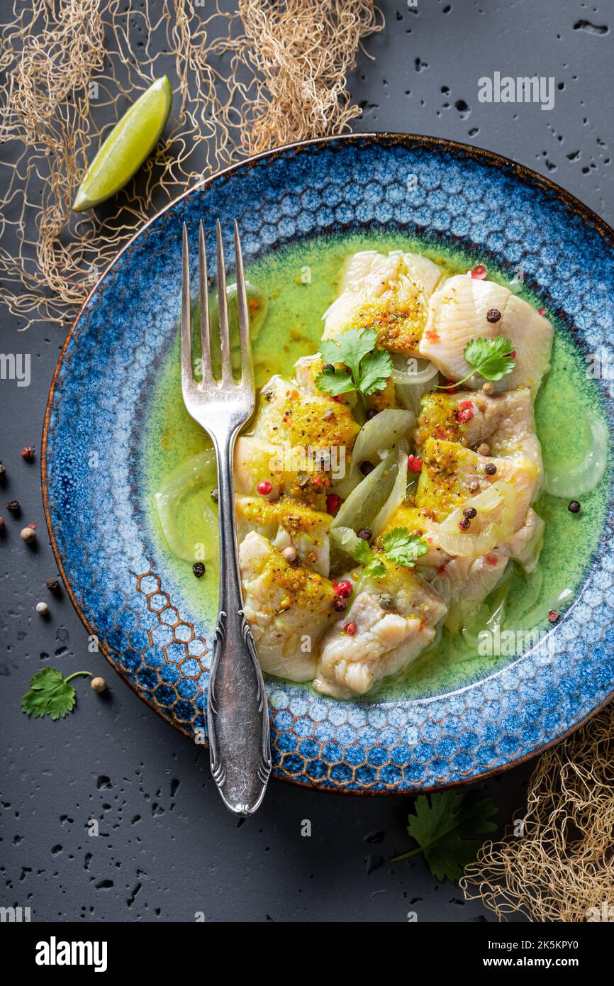 Healthy pickled fish as popular Polish snack. Herring marinated with ...