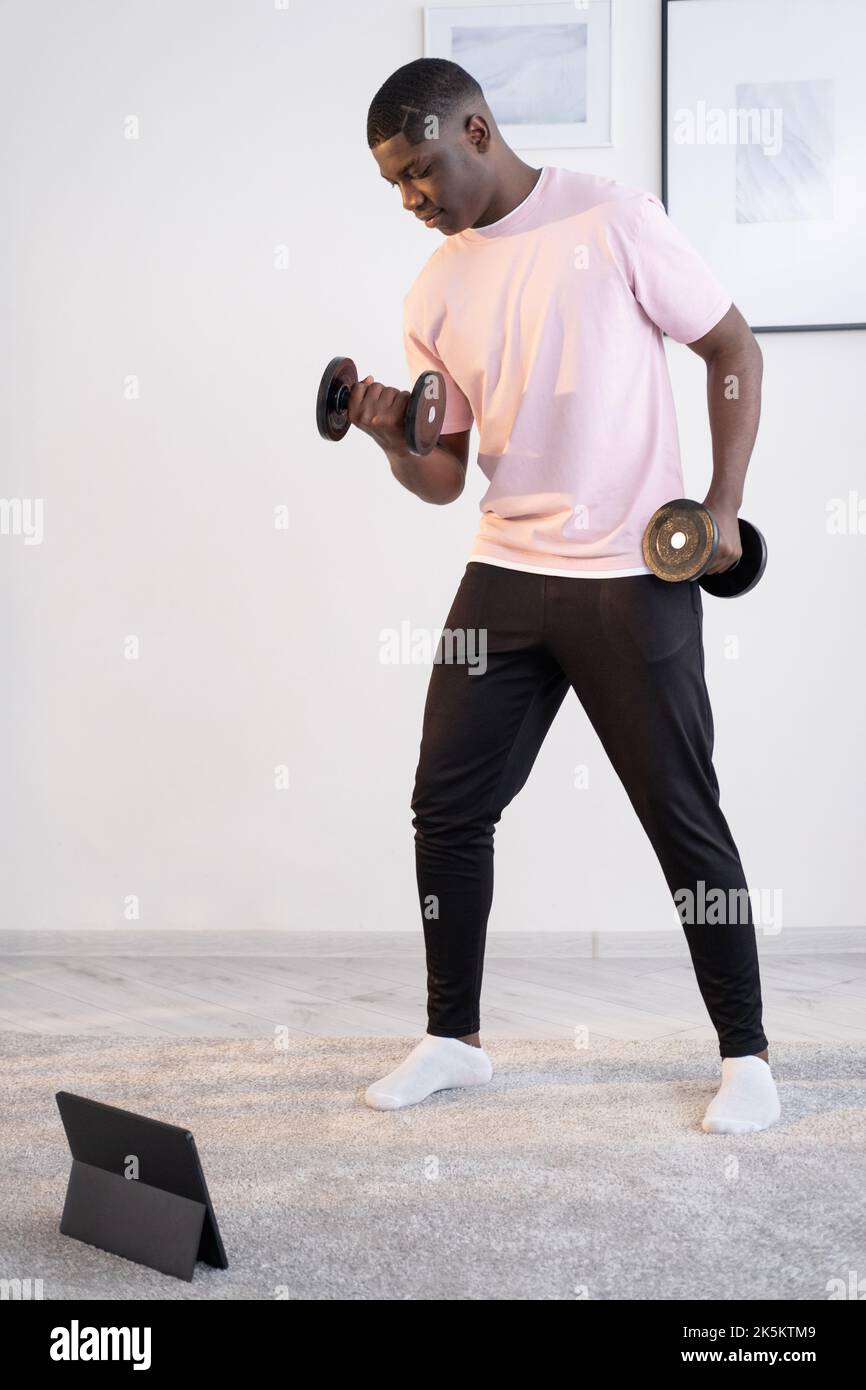 home sport muscular black man online gym body Stock Photo - Alamy