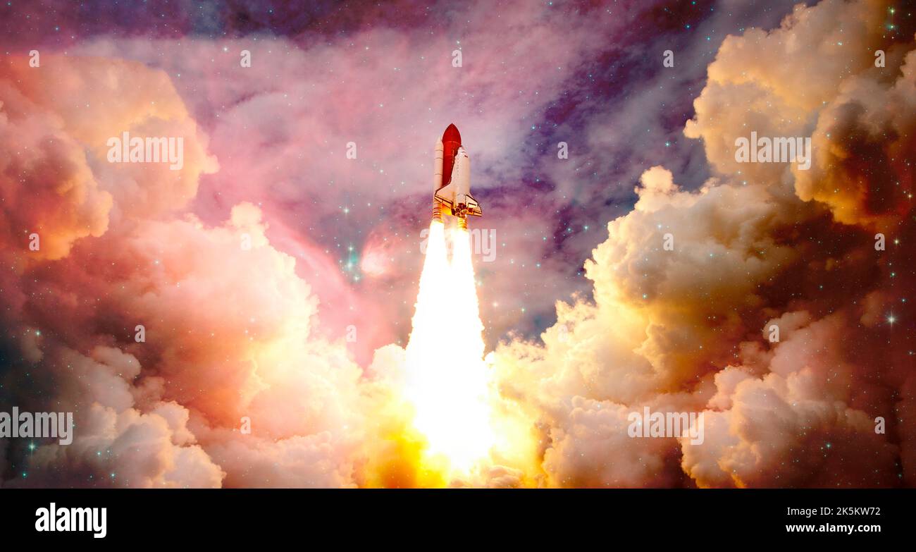 rockets launch into space on the starry sky. spacecraft flies into ...