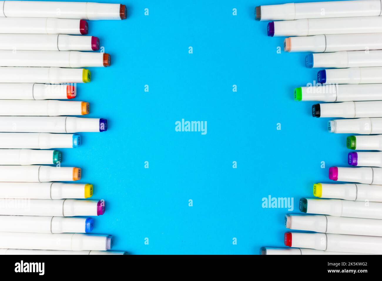 Frame of white markers on a blue background Stock Photo - Alamy