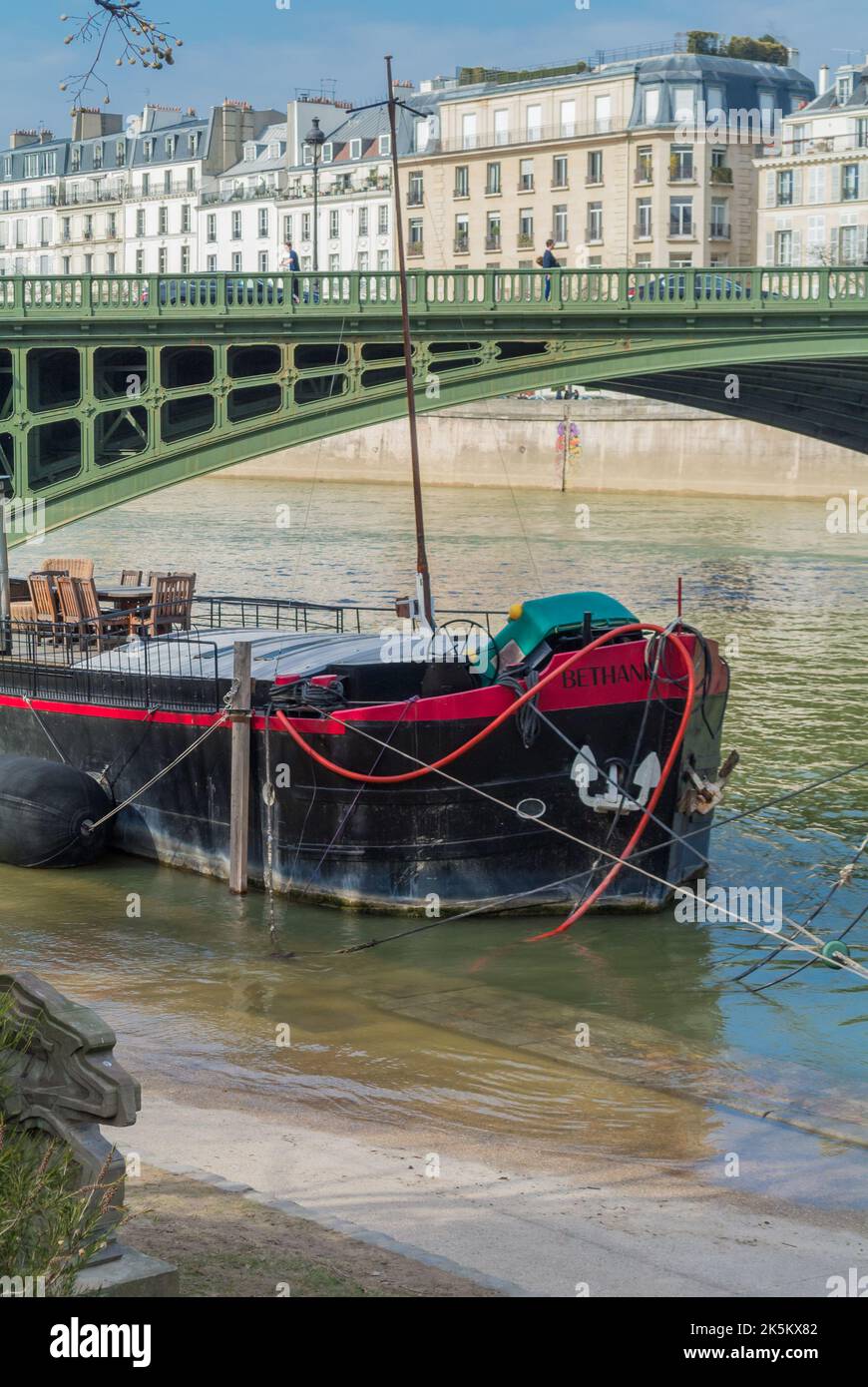 A boat under a bridge on Seine river, Flooding in 2018, Paris France ...