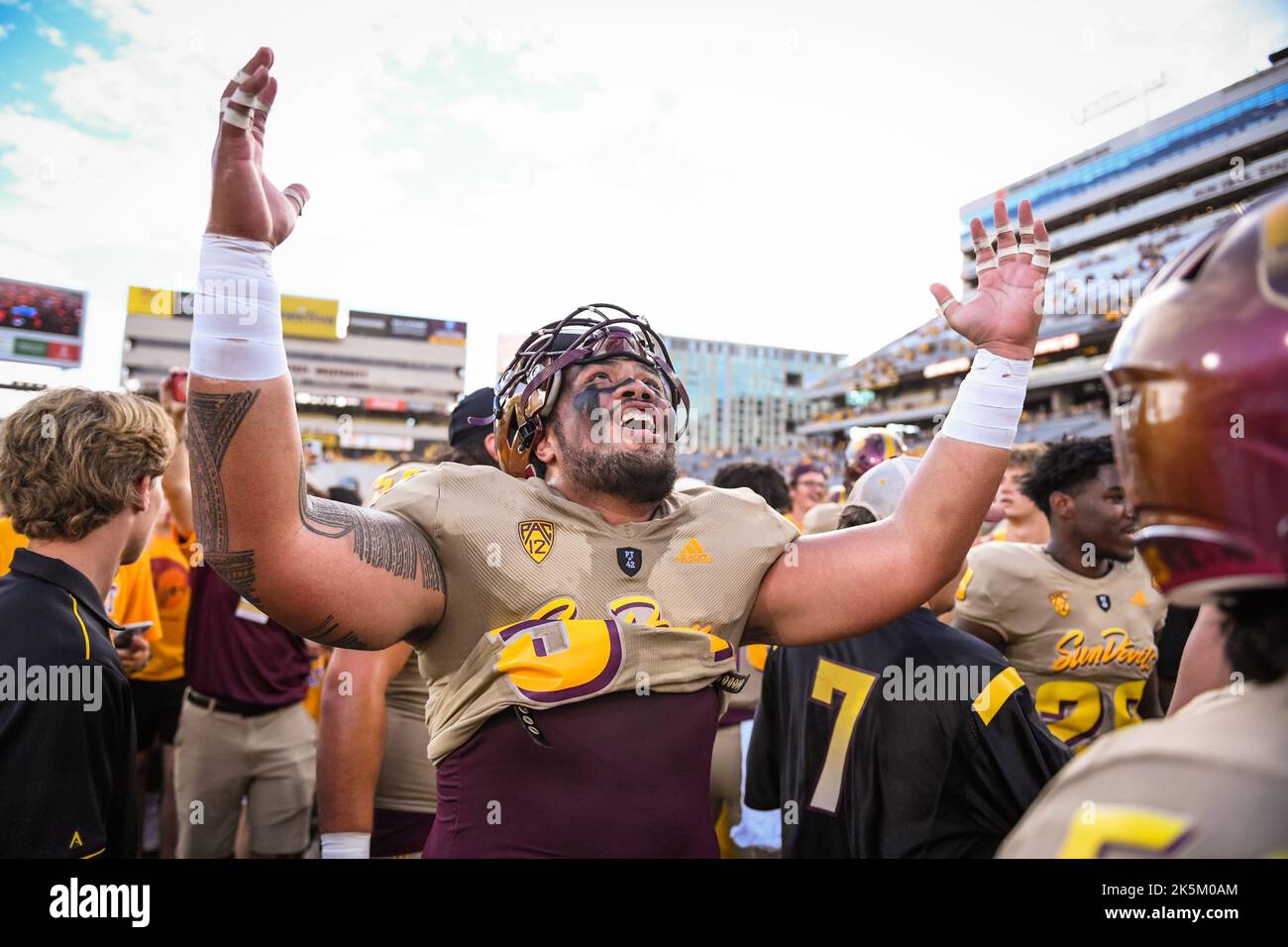 Arizona State offensive linemen Danny Valenzuela (55) celebrates a ...