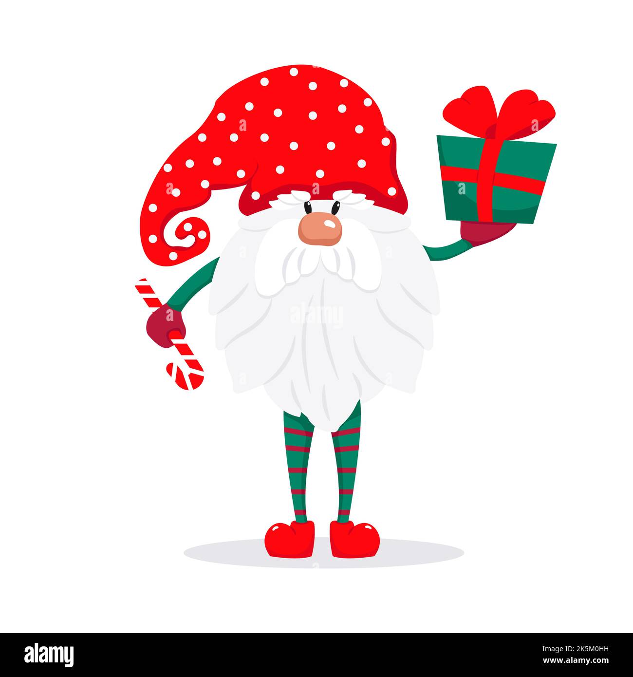 A bearded cute gnome in a red cap, a fairy-tale Christmas character ...