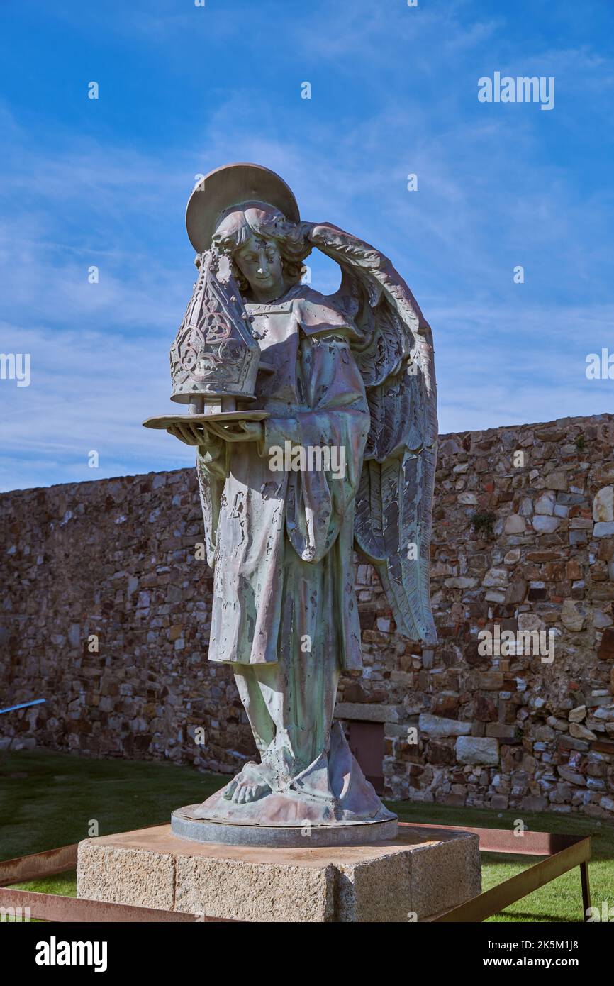 The angel sculpture with Bishop's symbol at the garden of the Palacio ...