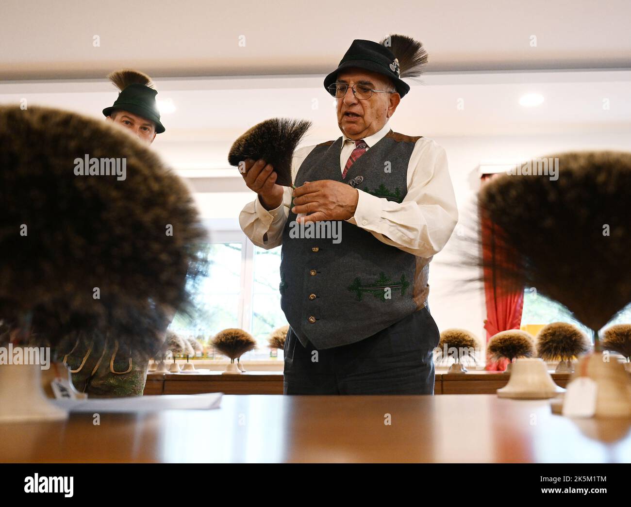 Mittenwald, Germany. 09th Oct, 2022. Jury members examine the submitted ...