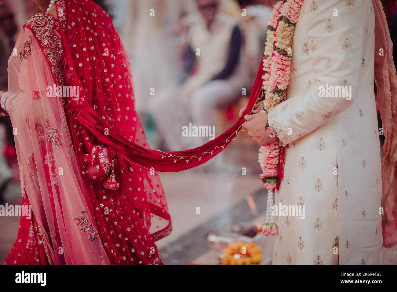 A view of the Hindu couple's hands during the wedding ceremony ...