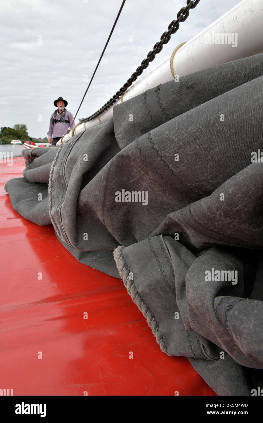 helmsman and canvas mainsail on norfolk wherry albion ludham norfolk ...