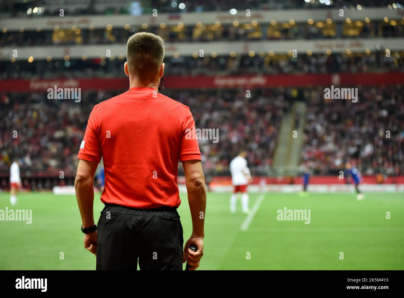 Soccer touchline referee during match at the football stadium Stock ...