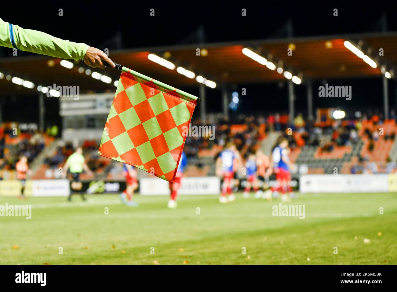 Soccer touchline referee's flag with the flag during match at the ...