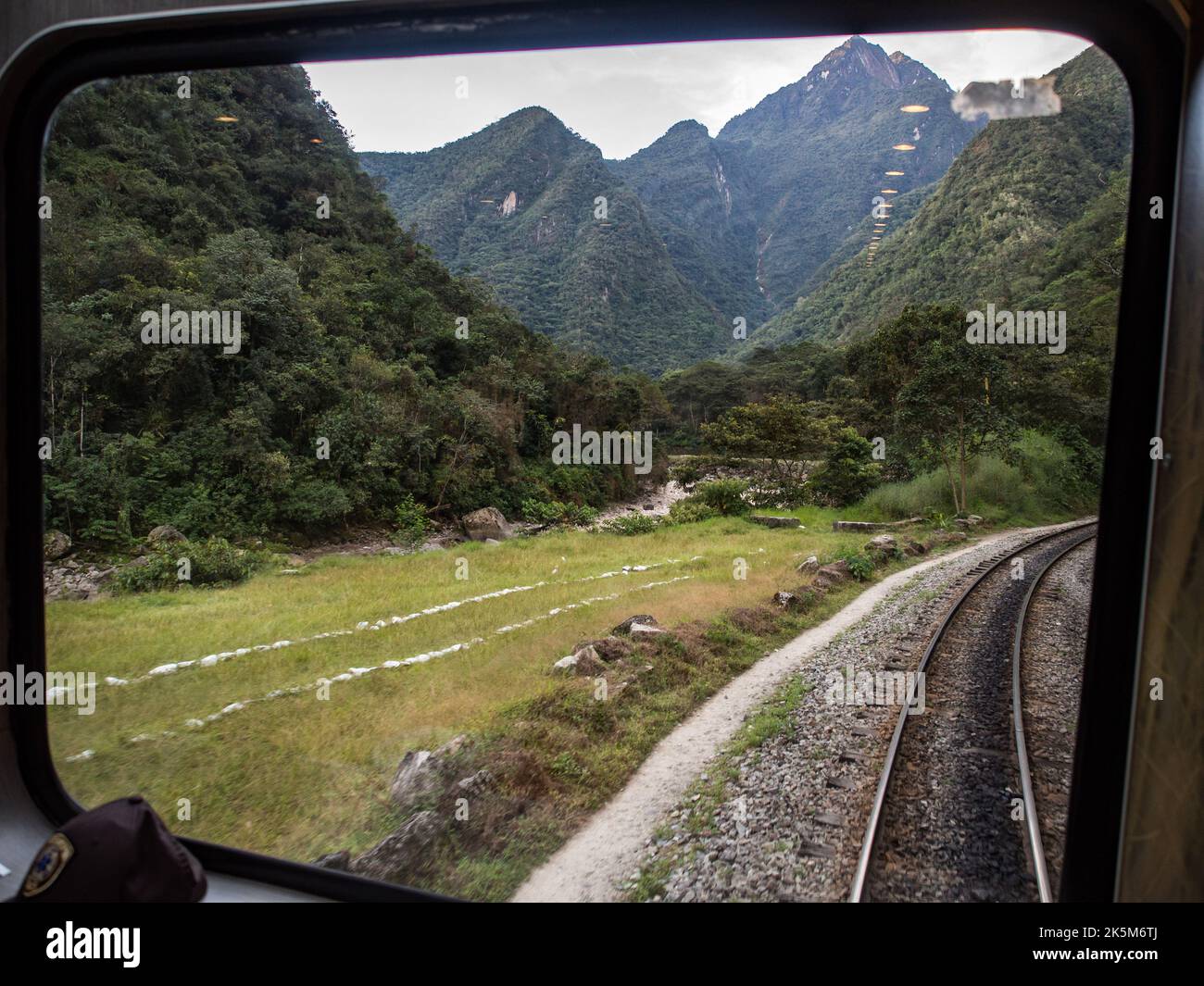 View for the Andes and track from window of PeruRail train. Peru. South ...