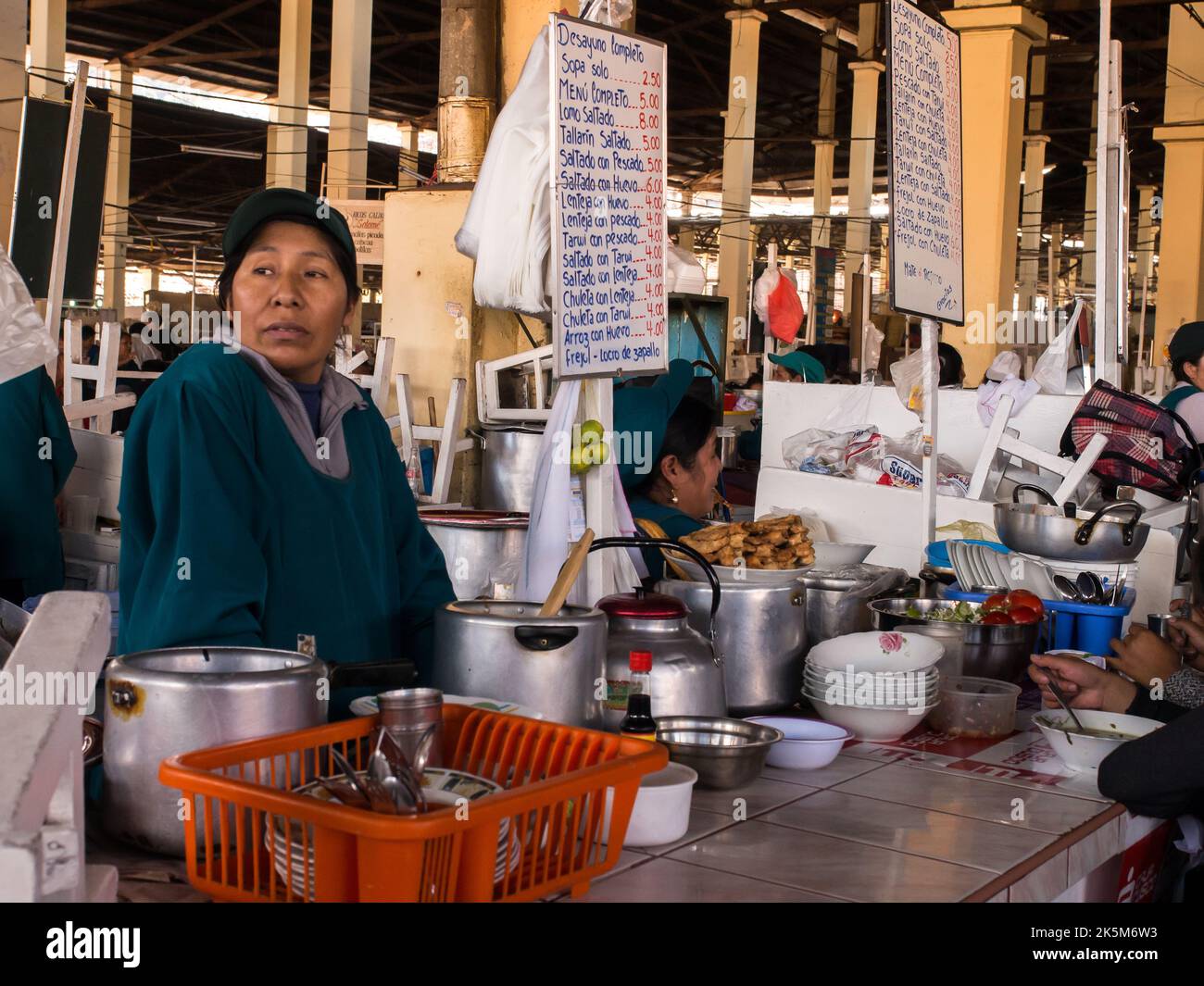 Cusco, Peru - May, 2016: Woman is selling cheap food on the market in ...