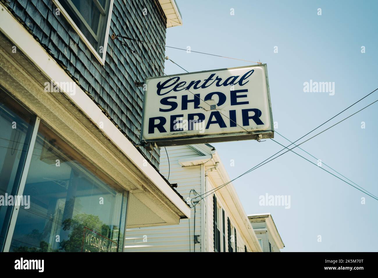 Antique shoe sign hi-res stock photography and images - Alamy