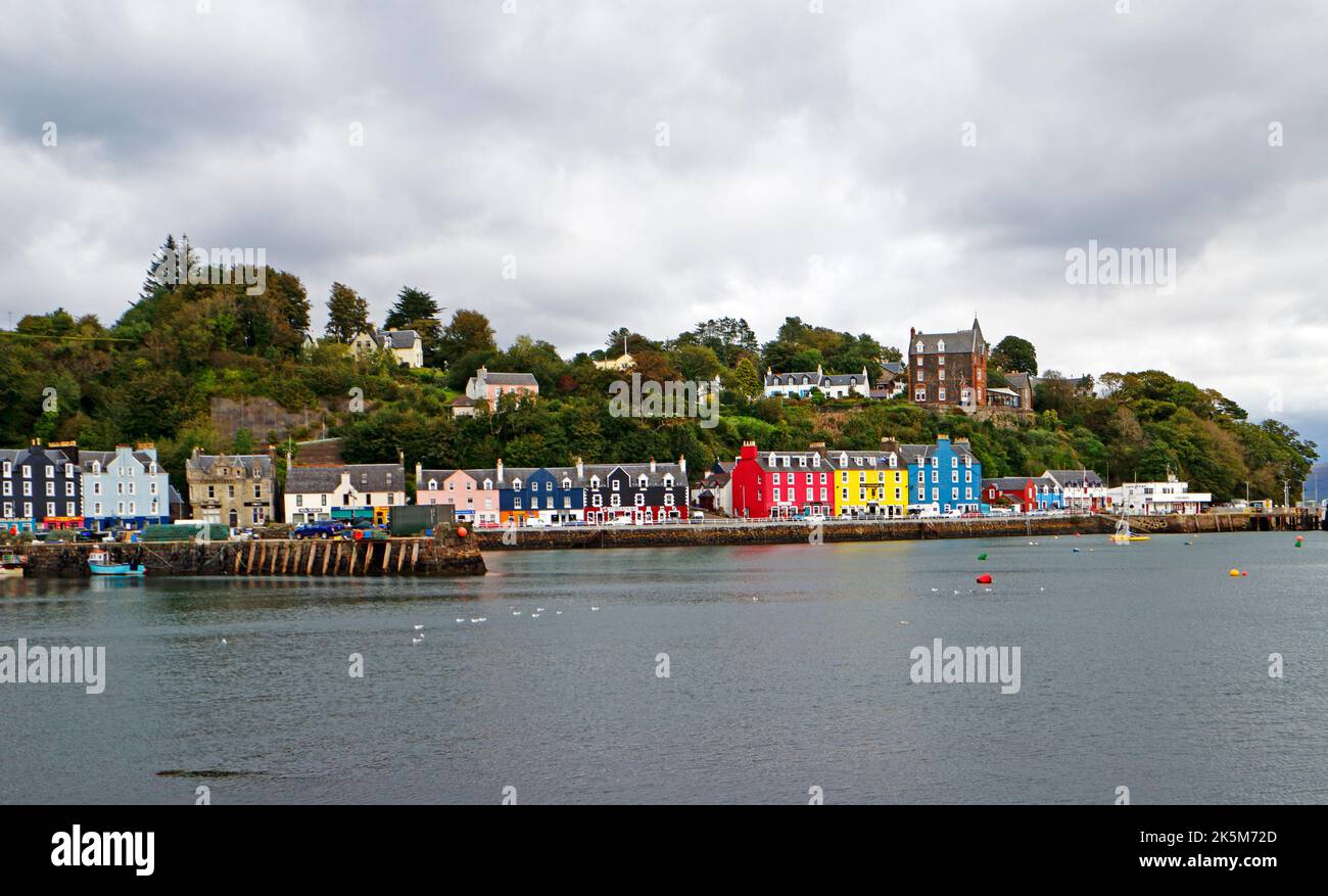 A view of the main street and colourful properties overlooking the ...