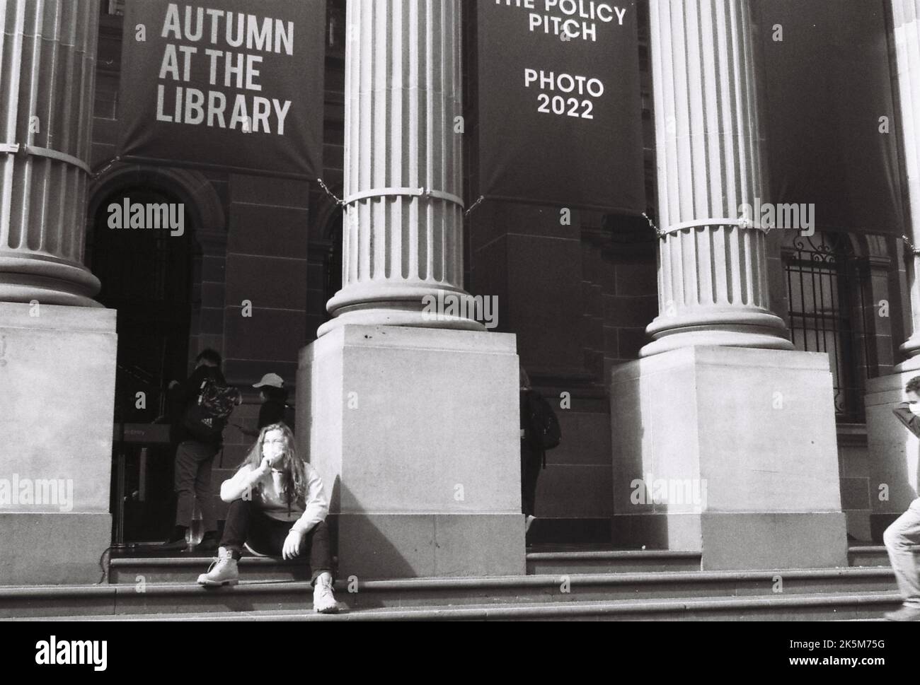 A grayscale of the exterior of the State Library Victoria in Melbourne ...