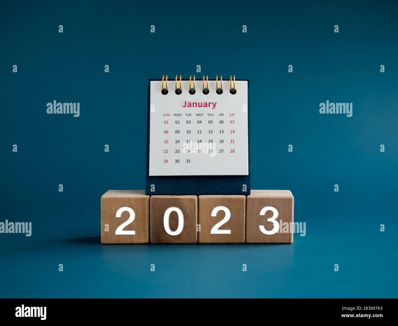 Happy New Year 2023. 2023 year number on wooden cube blocks and the ...