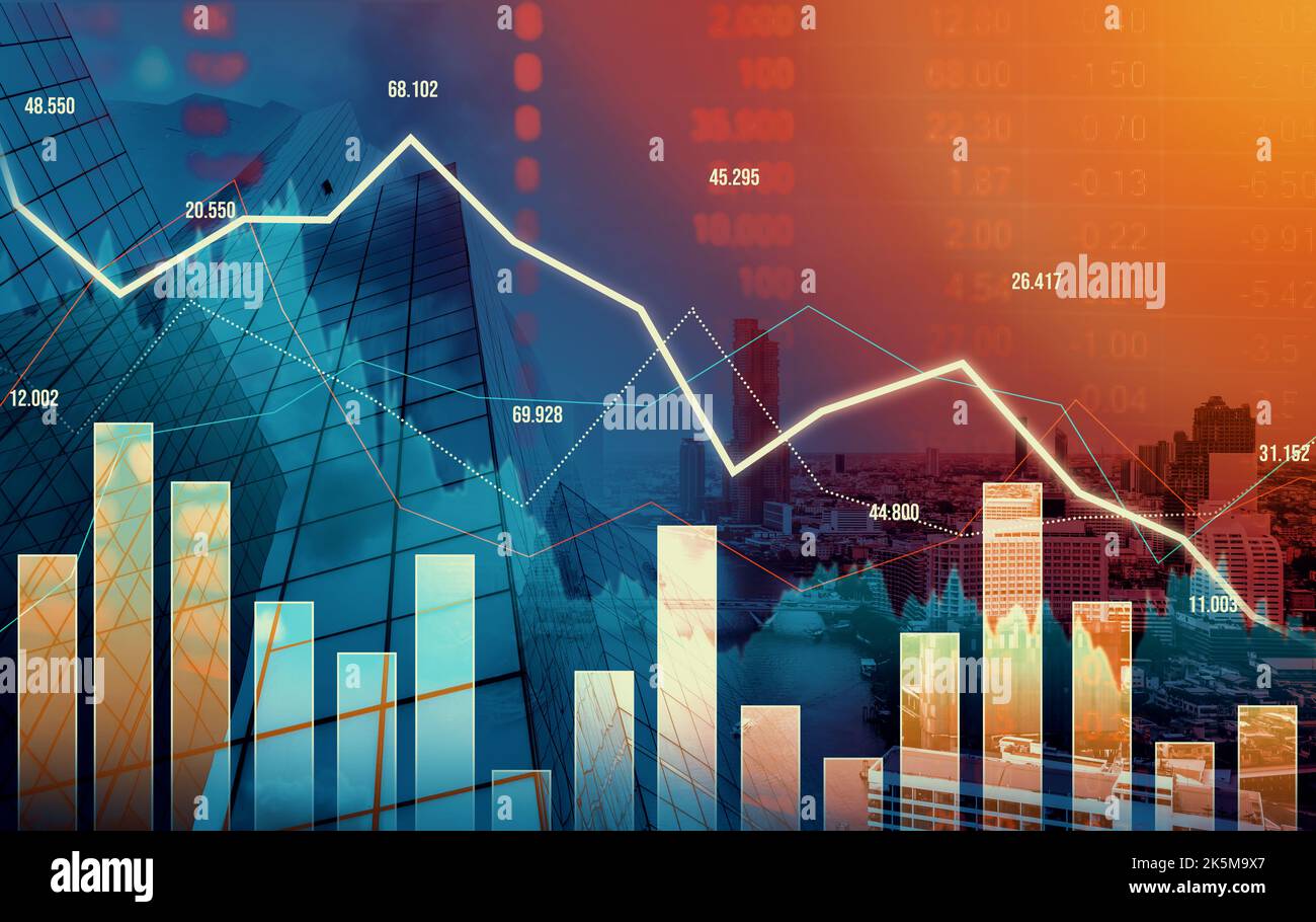 Economic crisis concept shown by declining graphs and digital ...