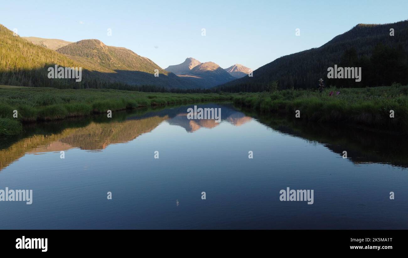 The Bear River with the Uinta Mountains in the background in Utah, USA ...