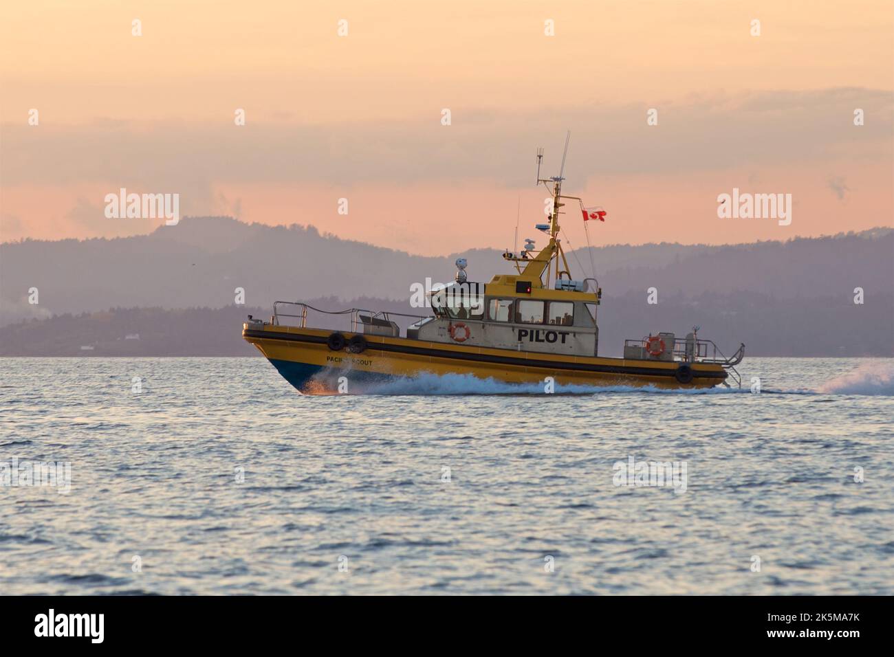 The Victoria Harbor pilot boat heading out to meet a tanker ship ...