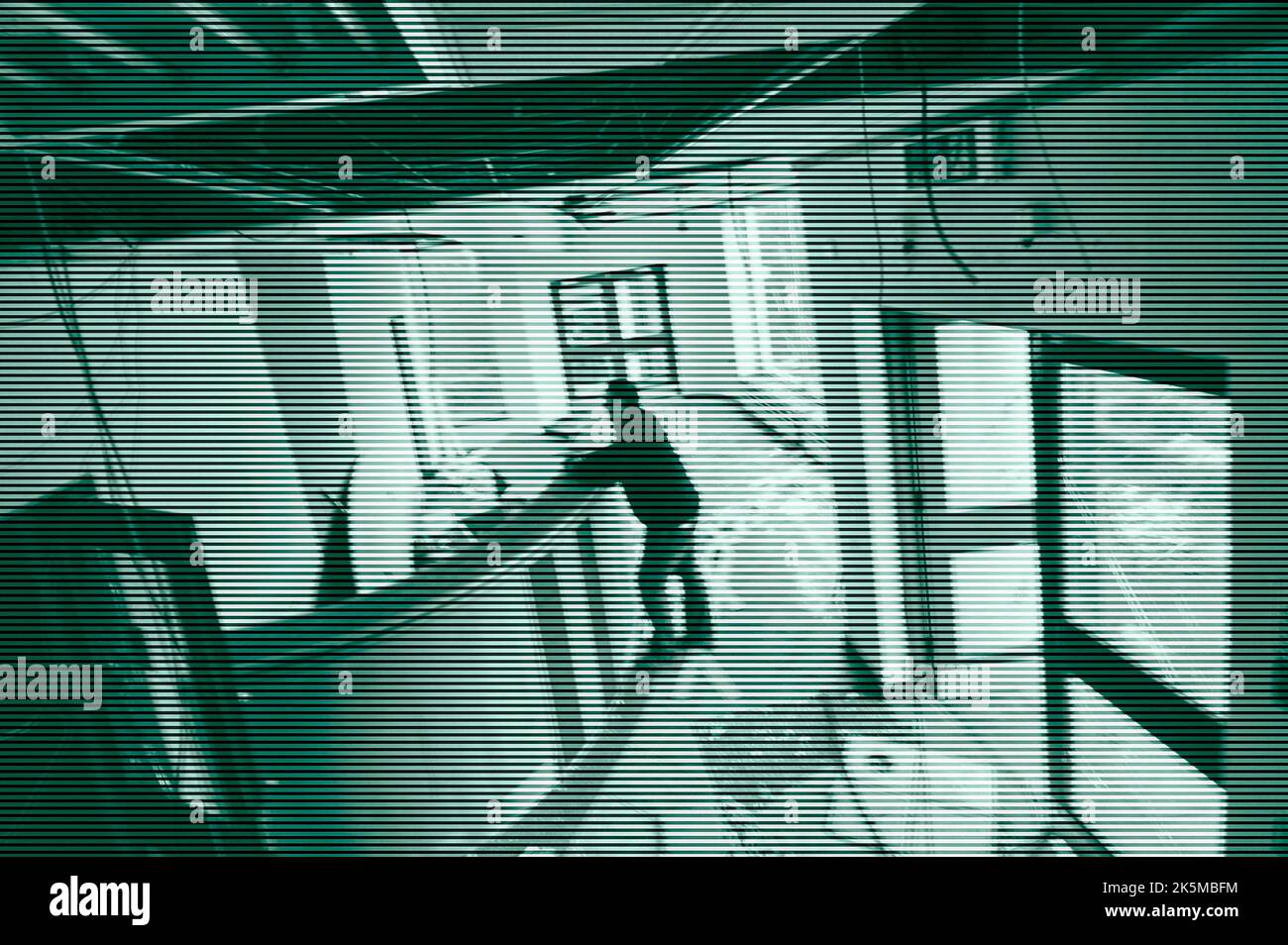 Simulated CCTV screenshot, showing a man at a reception desk of an ...