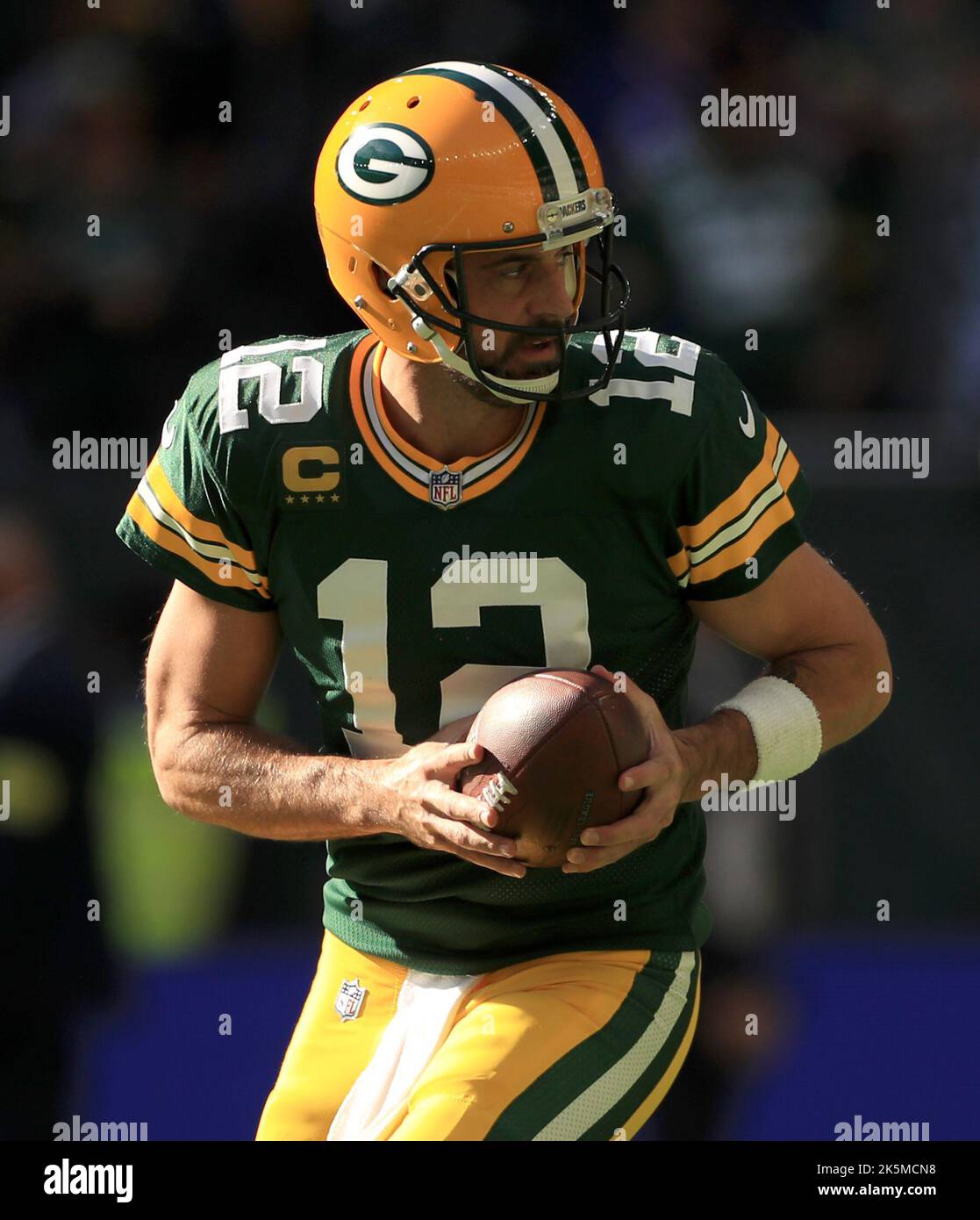Green Bay Packers' Aaron Rodgers warms up prior to the NFL ...