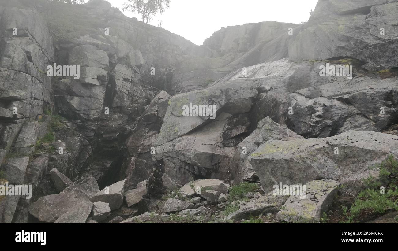 Giant rocks in a mountain under the bright sunlight Stock Photo - Alamy