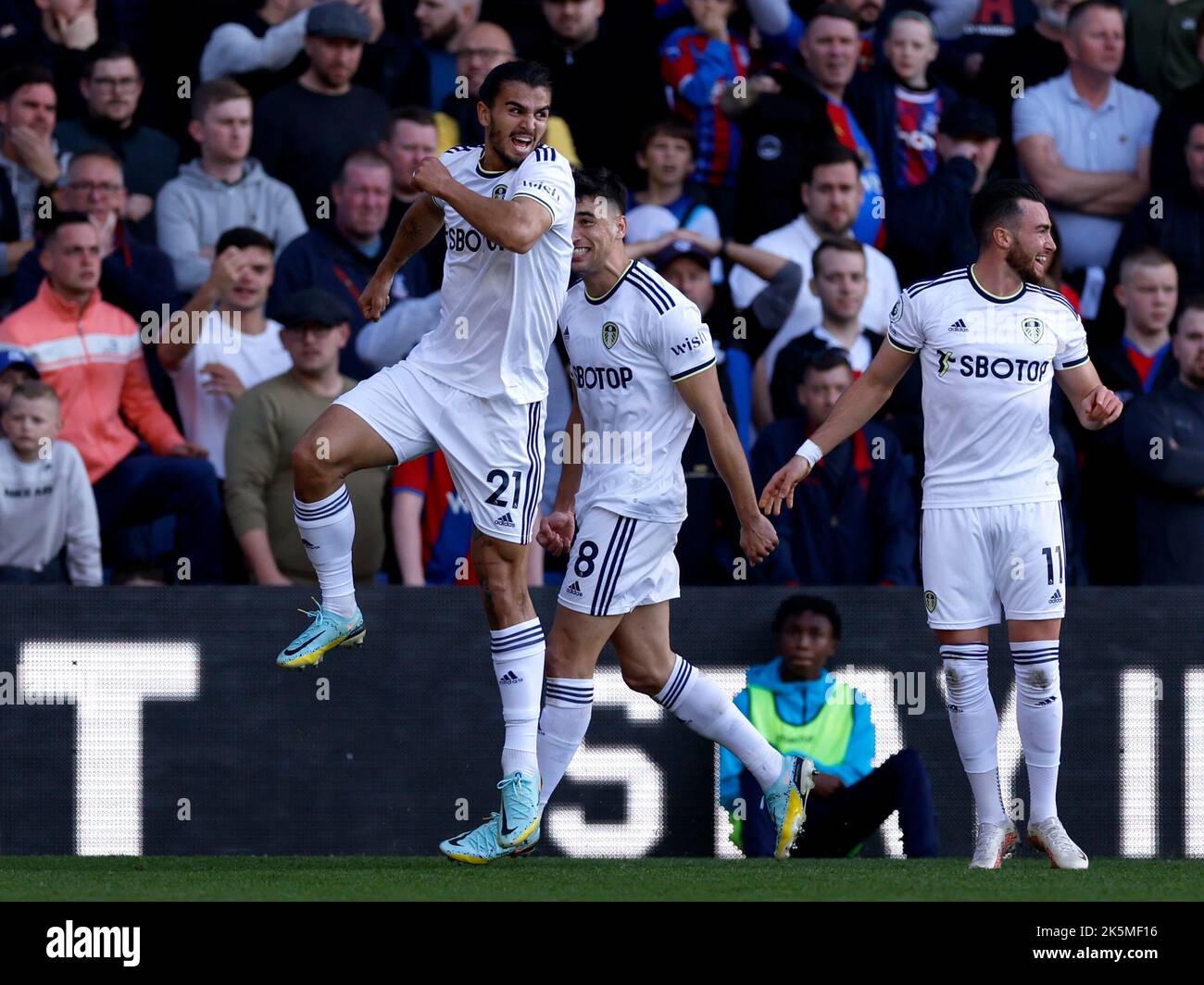 Leeds United's Pascal Struijk (left) celebrates with team-mates after ...