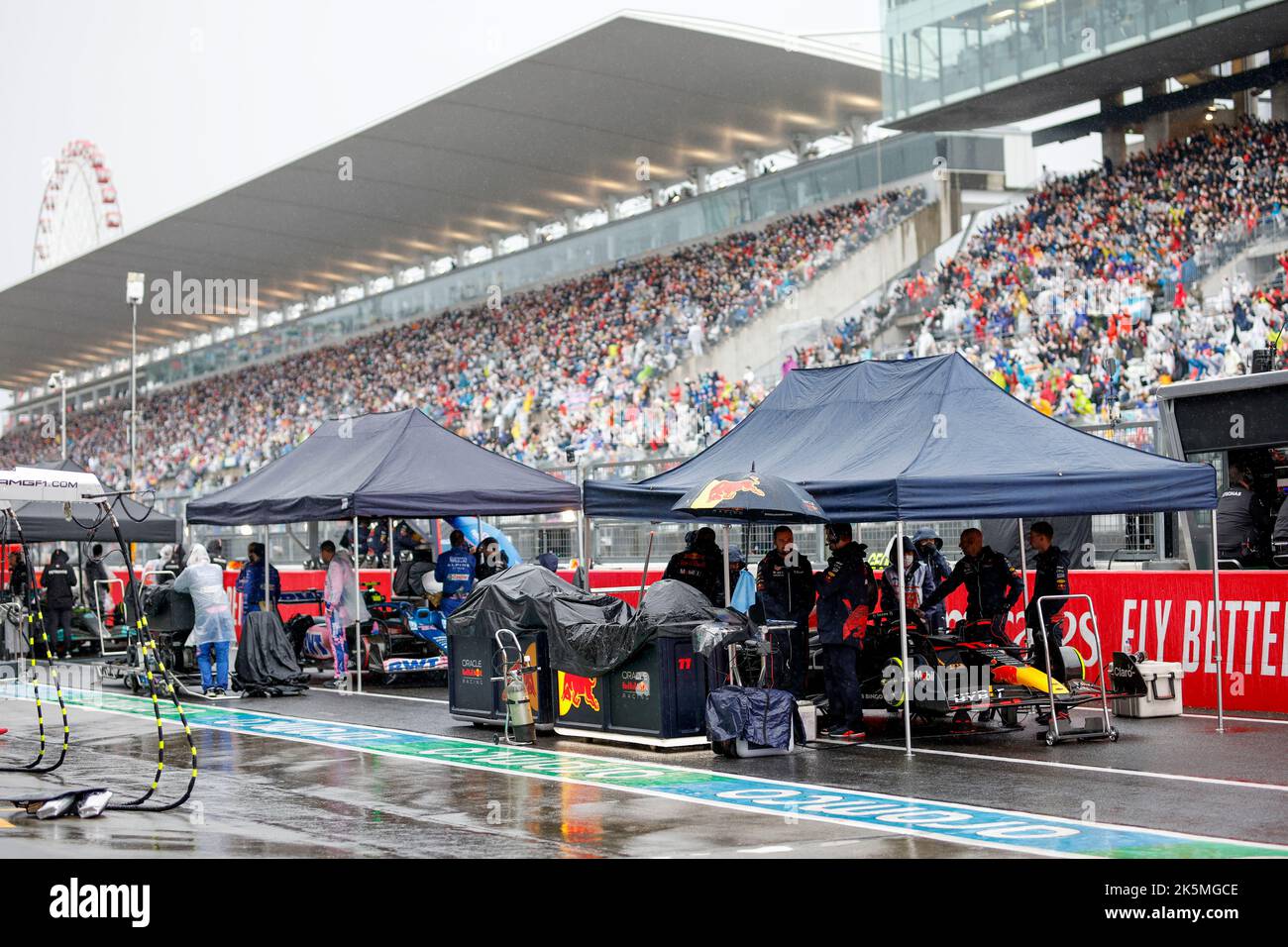 Cars lining up in the pitlane during the red flag during the Formula 1 ...