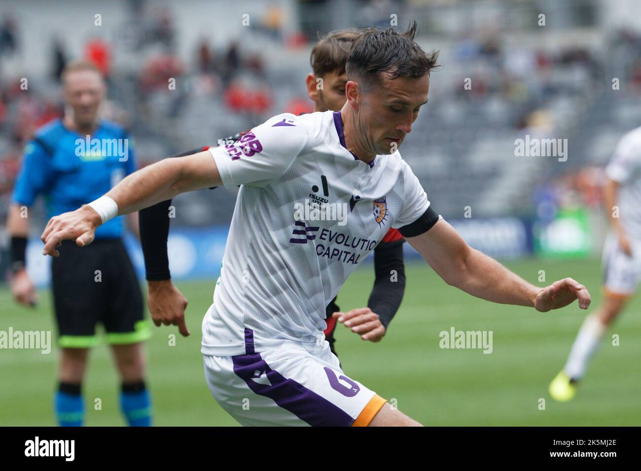 SYDNEY, AUSTRALIA - OCTOBER 9: Aaron McEneff of Perth Glory manoeuvring ...