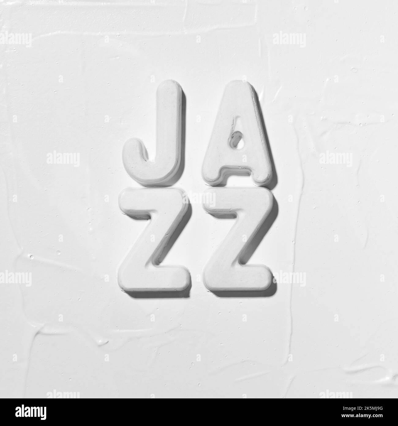 Jazz word - Inscription by white moulded letters on stucco Stock Photo ...