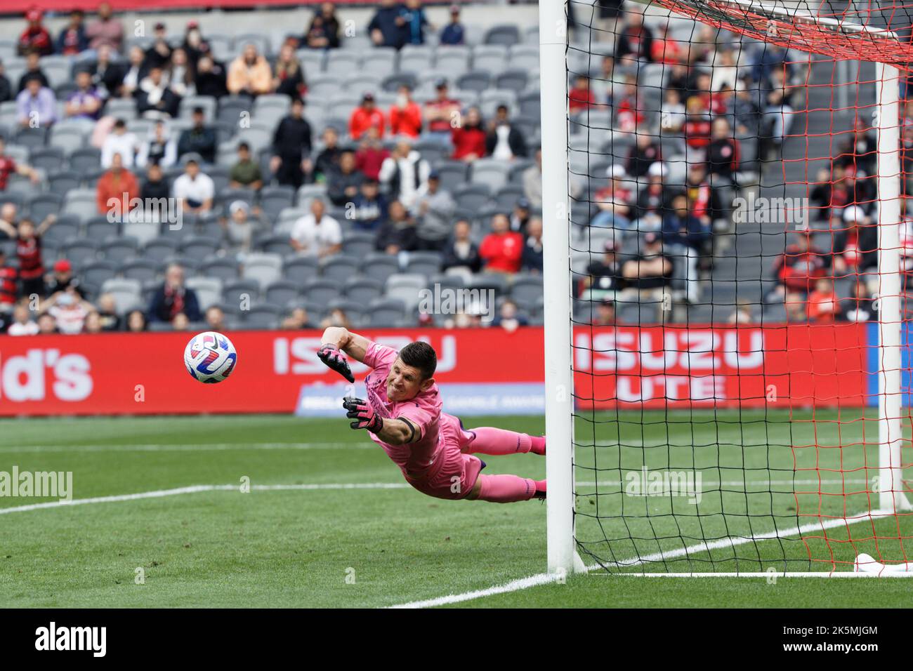 SYDNEY, AUSTRALIA - OCTOBER 9: Liam Reddy of Perth Glory dives to save ...