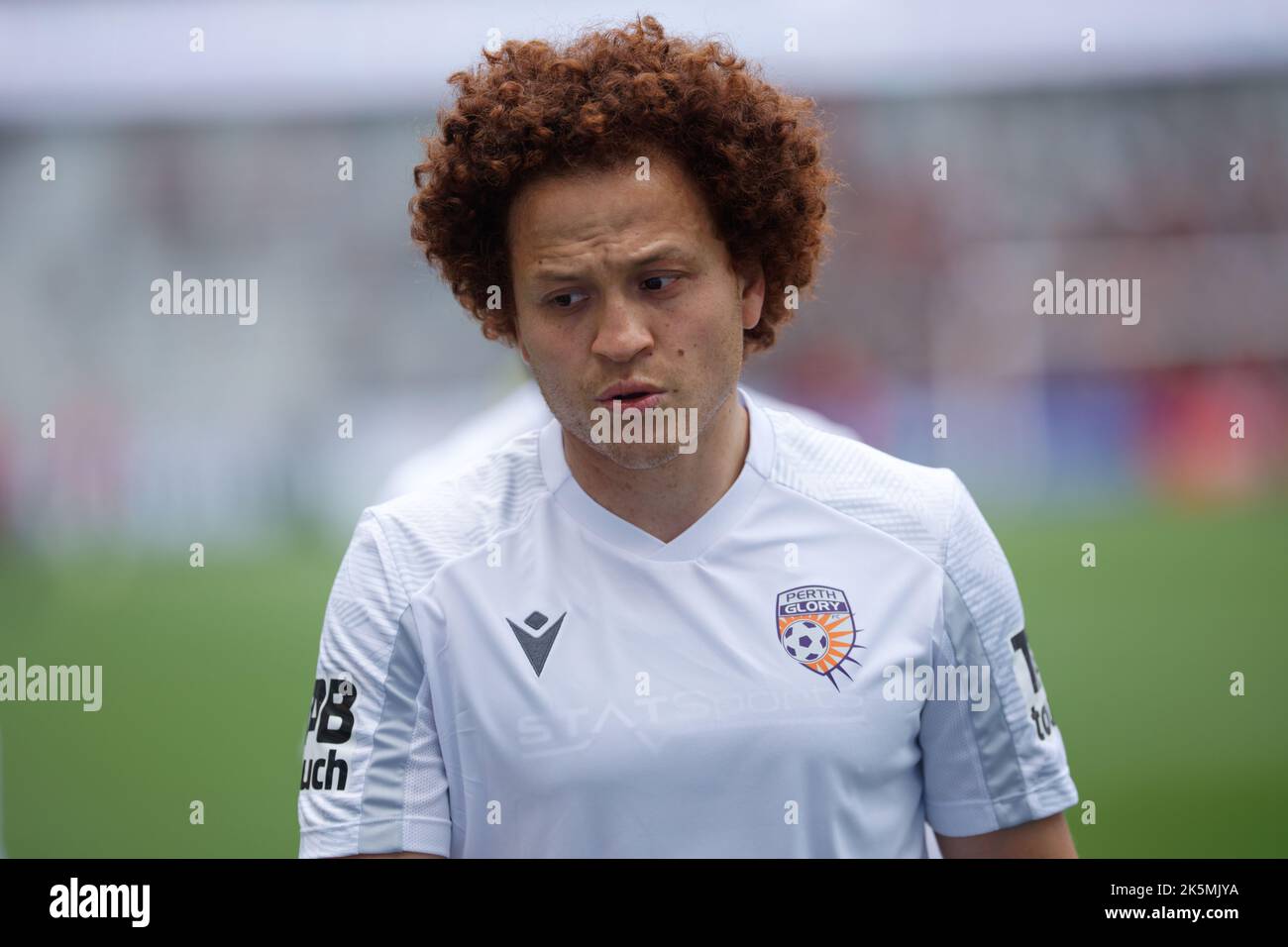 SYDNEY, AUSTRALIA - OCTOBER 9: Mustafa Amini of Perth Glory looks on ...
