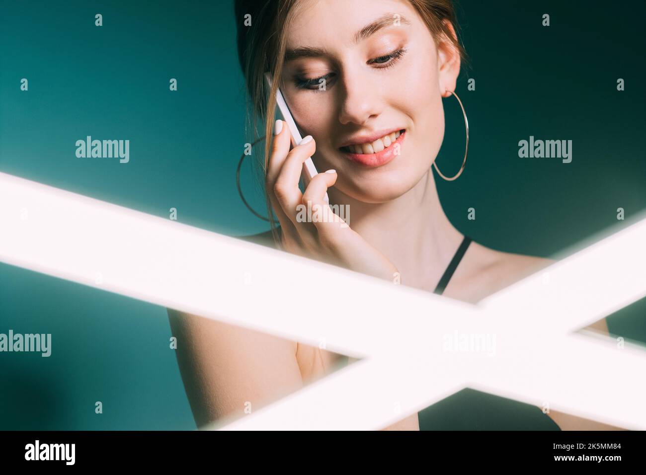 Phone call. Mobile communication. Modern technology. Cheerful smiling ...